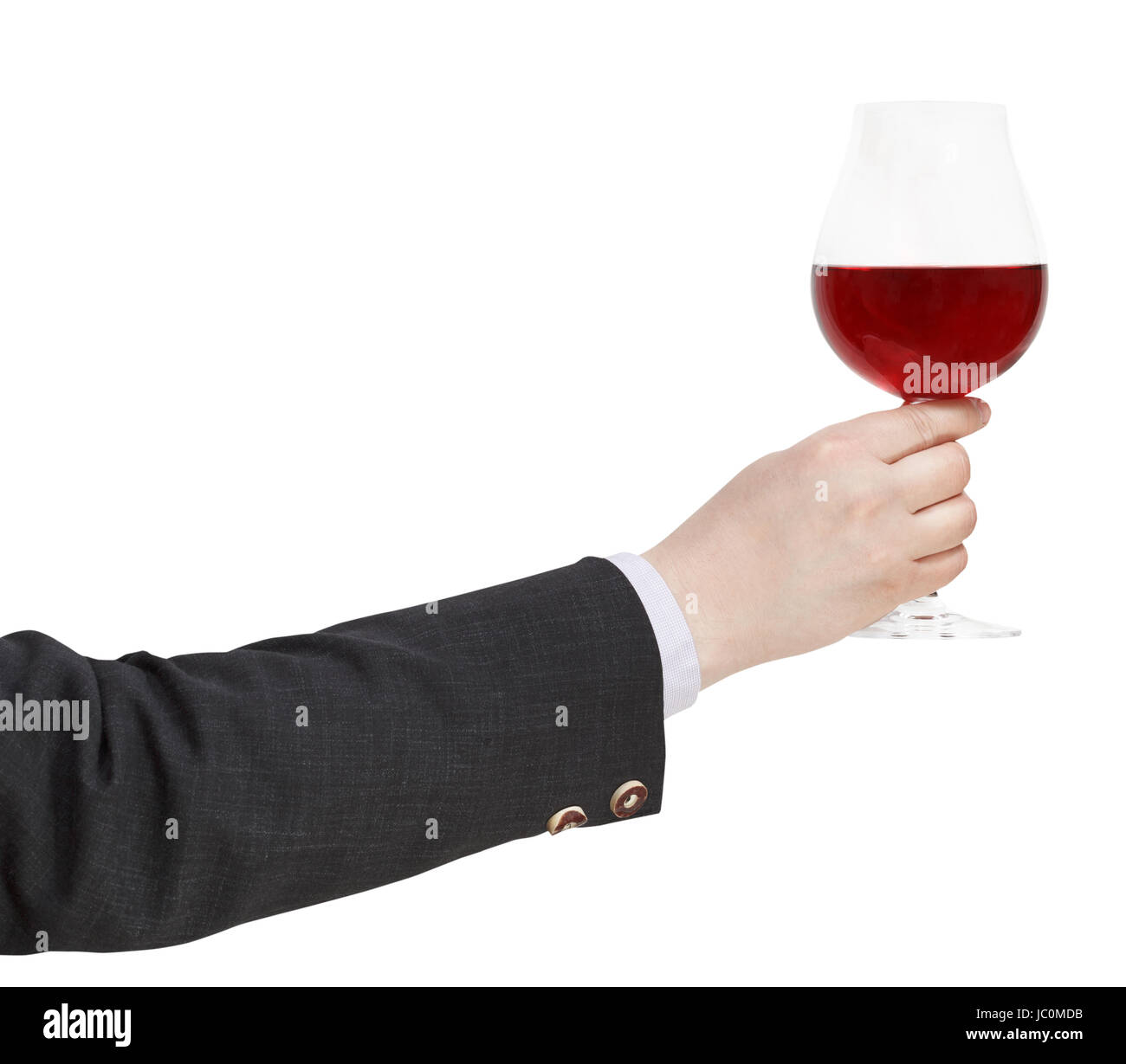 side view of red wine glass in businessman hand isolated on white ...
