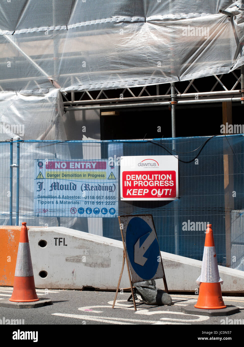 Contractors demolition in progress sign Stock Photo - Alamy