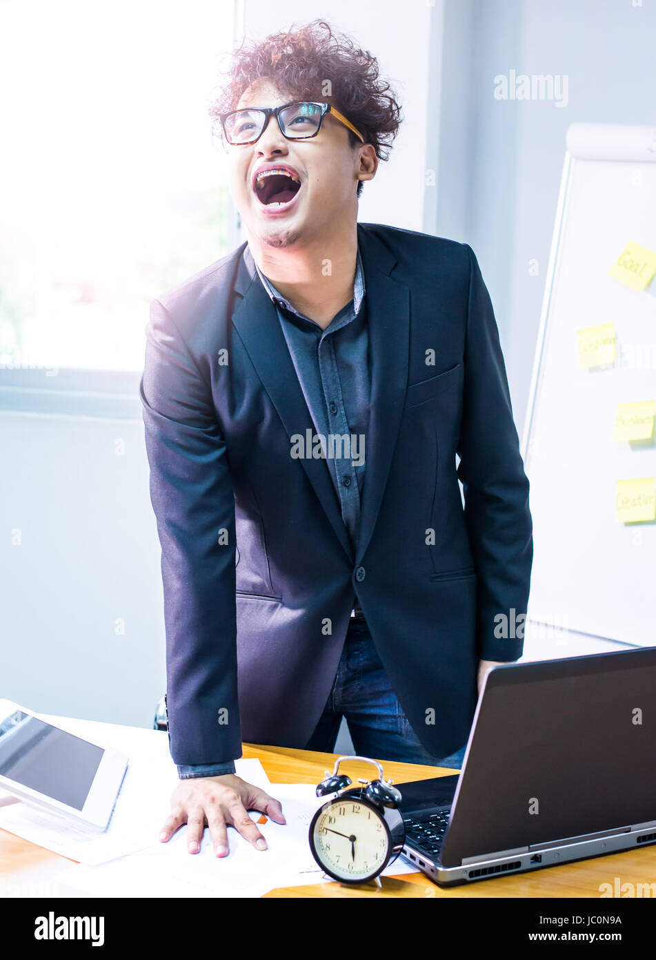busy and headache person, unsuccessful businessman Stock Photo - Alamy