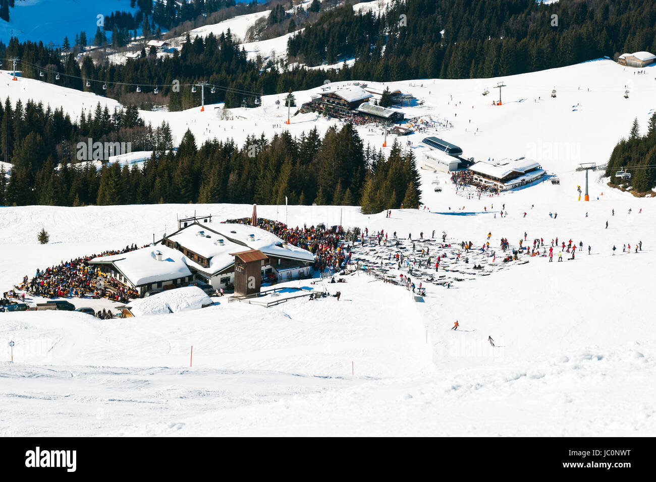 view of mountain village and downhill ski slopes in Saalbach ...