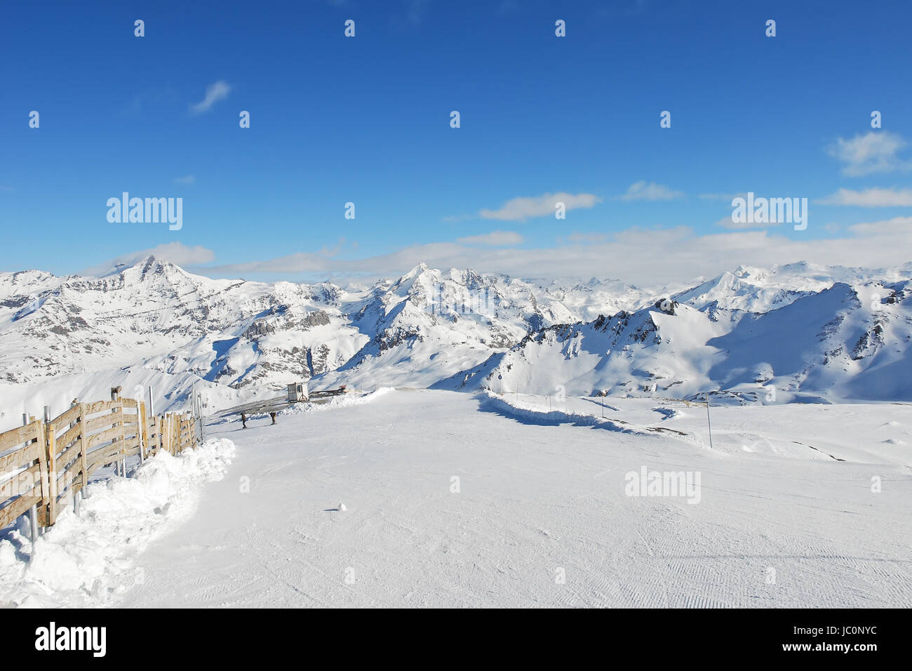 skiing road on mountain snow slope in Paradiski region, Les Coches ...
