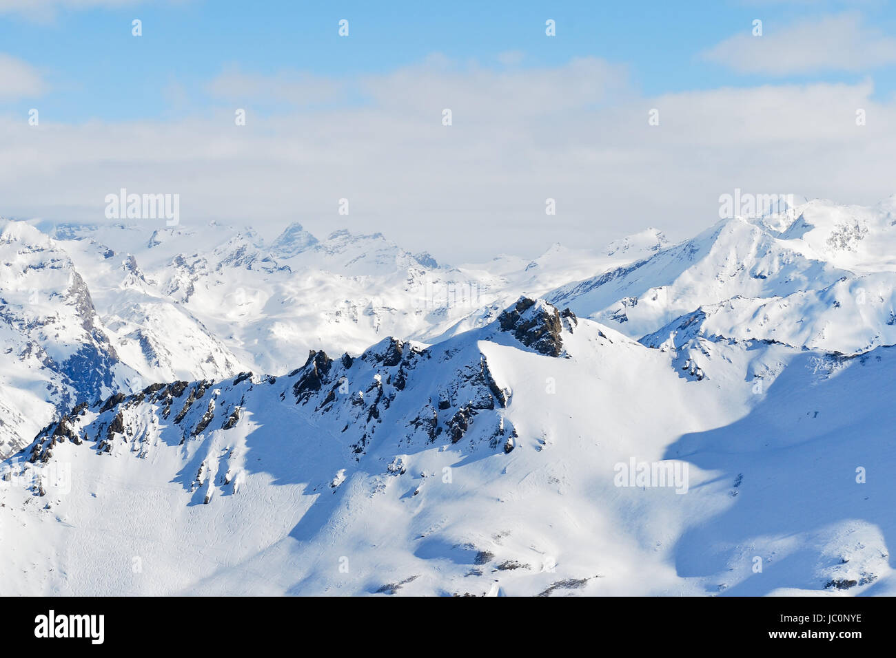 skiing tracks on mountain slopes in Paradiski region, Les Coches ...