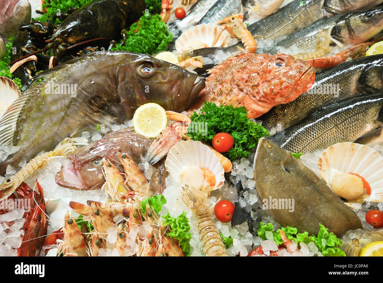 raw fresh fish and seafood on street market in Italy Stock Photo - Alamy