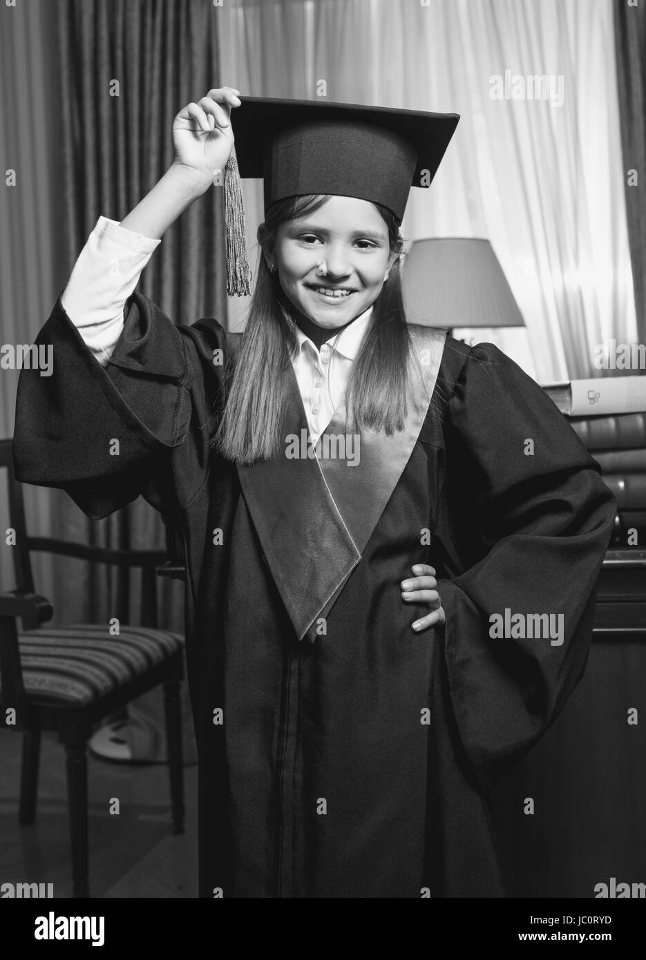 Black cap and gown Black and White Stock Photos & Images - Alamy