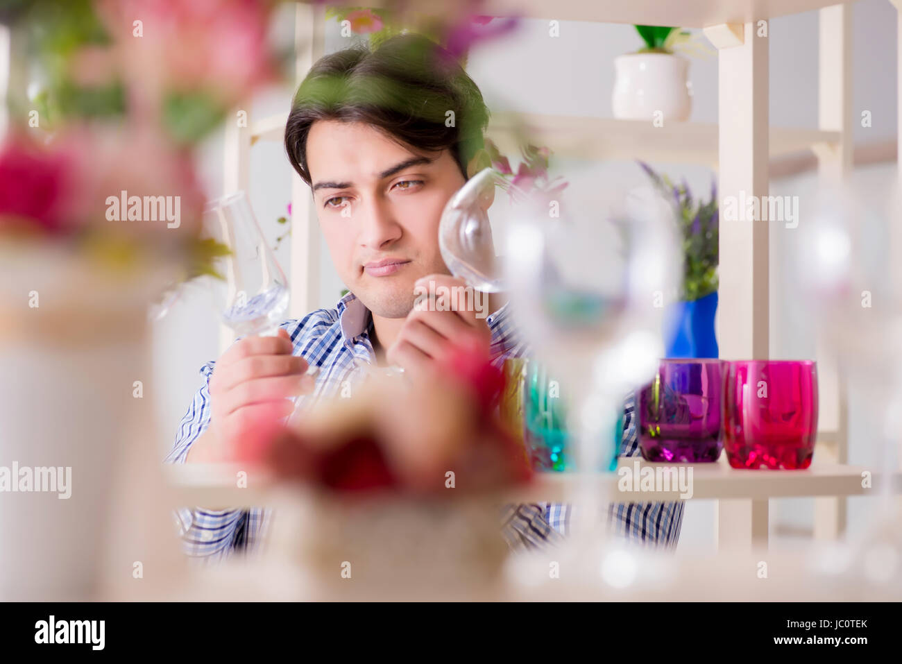 Young handsome man shopping in shop Stock Photo - Alamy