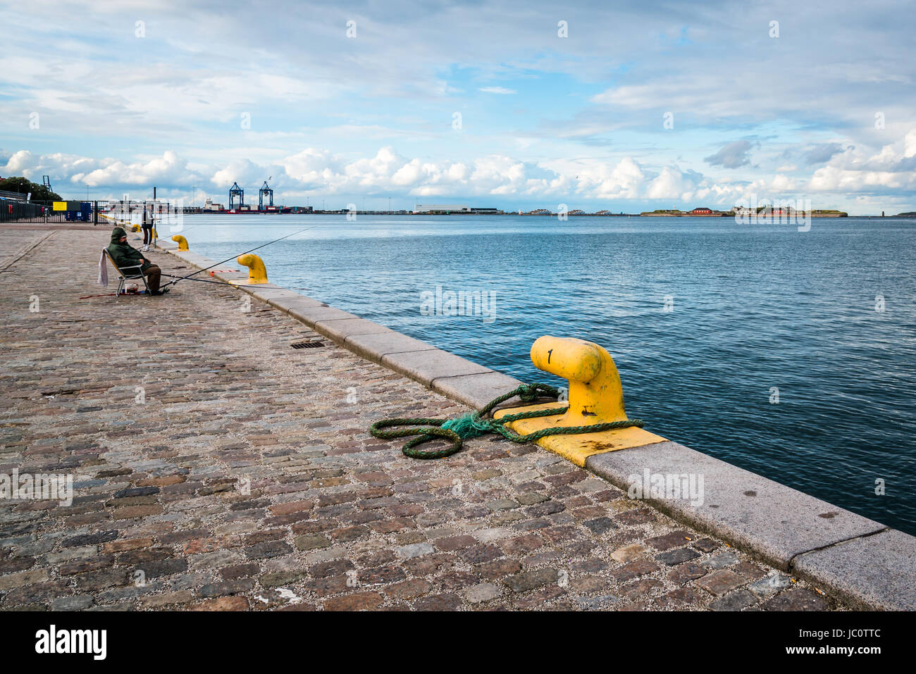 Langeline dock with fishermen in Copenhagen Stock Photo - Alamy