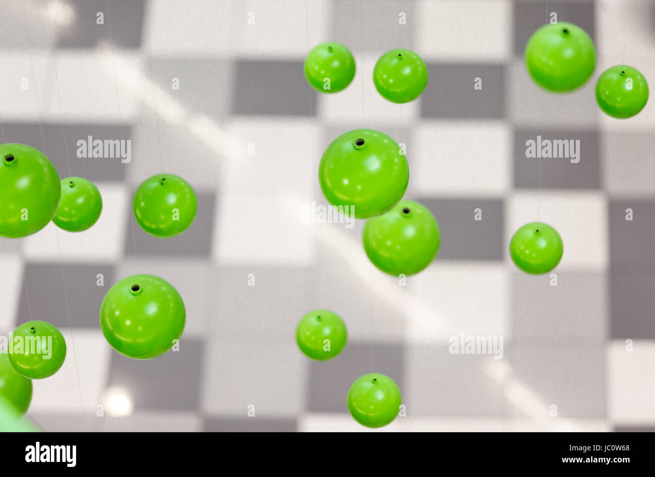 Abstract photo of 3d green spheres falling on gray background Stock ...