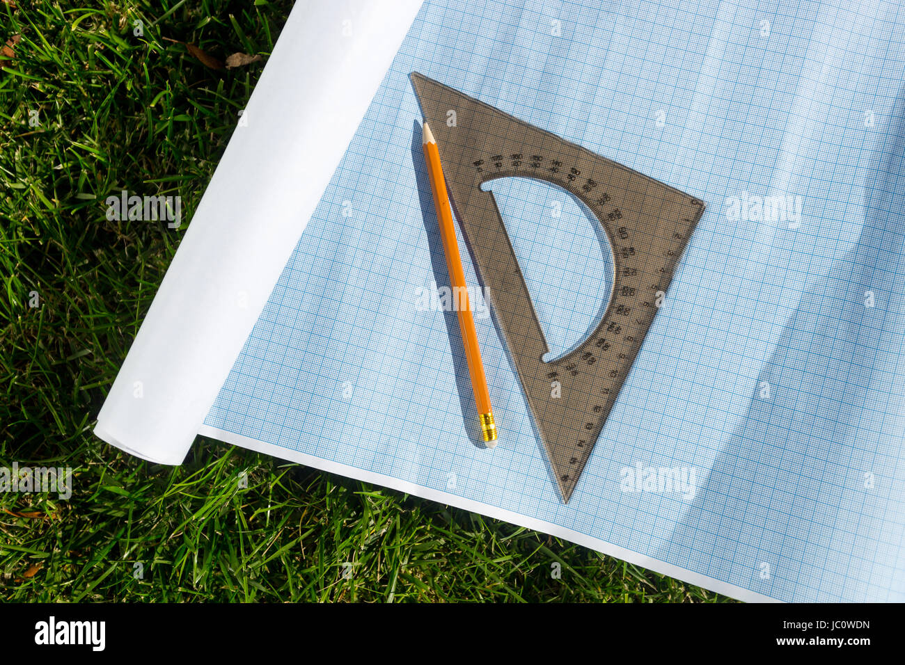 Closeup photo of ruler and pencil lying on blueprints Stock Photo - Alamy