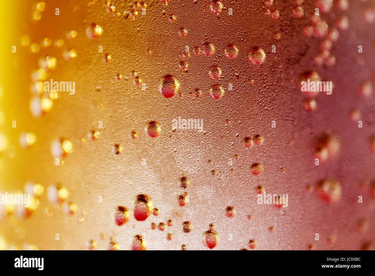 color macro of sparkle water drops on dewy glass for background or ...