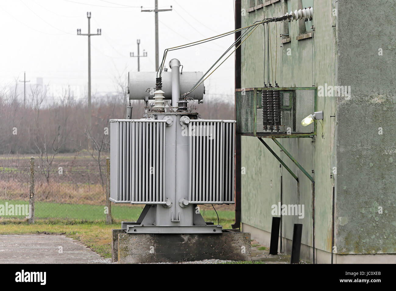 Electric substation with step down voltage transformer of AC power ...