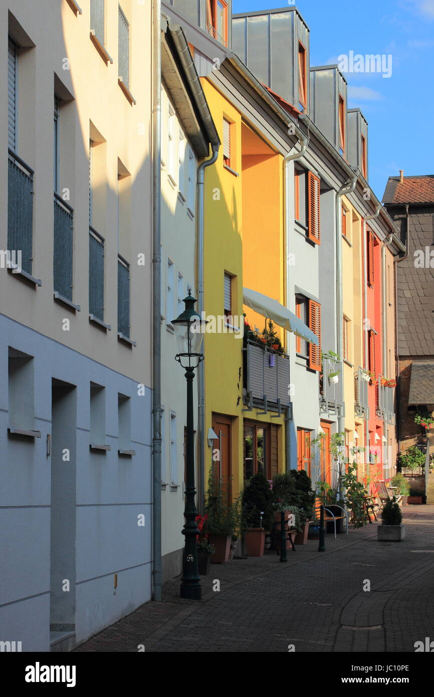 Small alley in historic town with colorful house fronts Stock Photo - Alamy