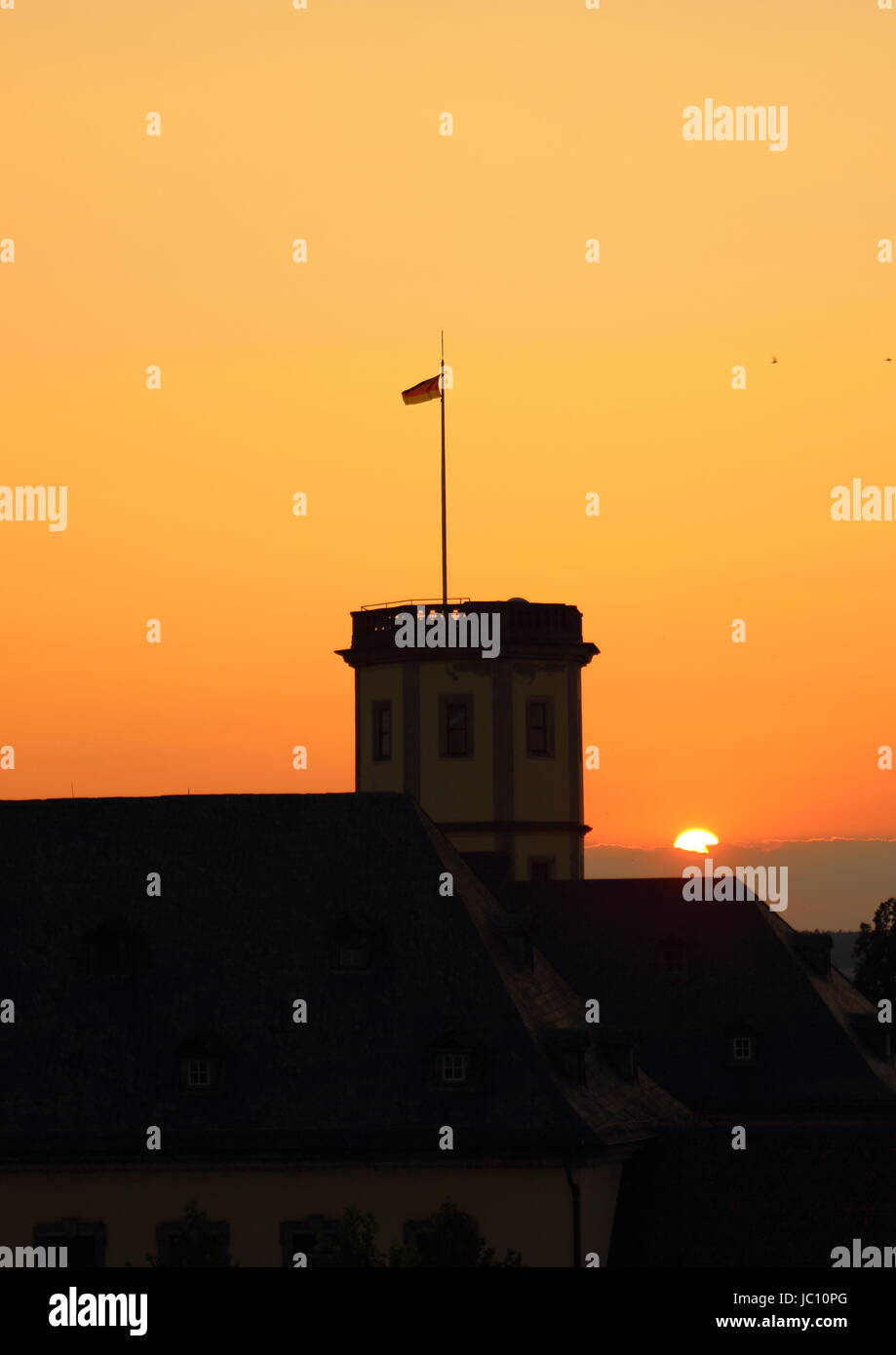 Sunset over old german castle tower Stock Photo - Alamy