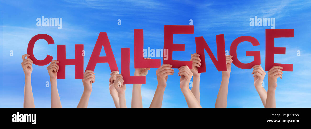 Many Hands Holding the Word Challenge in the Sky Stock Photo - Alamy
