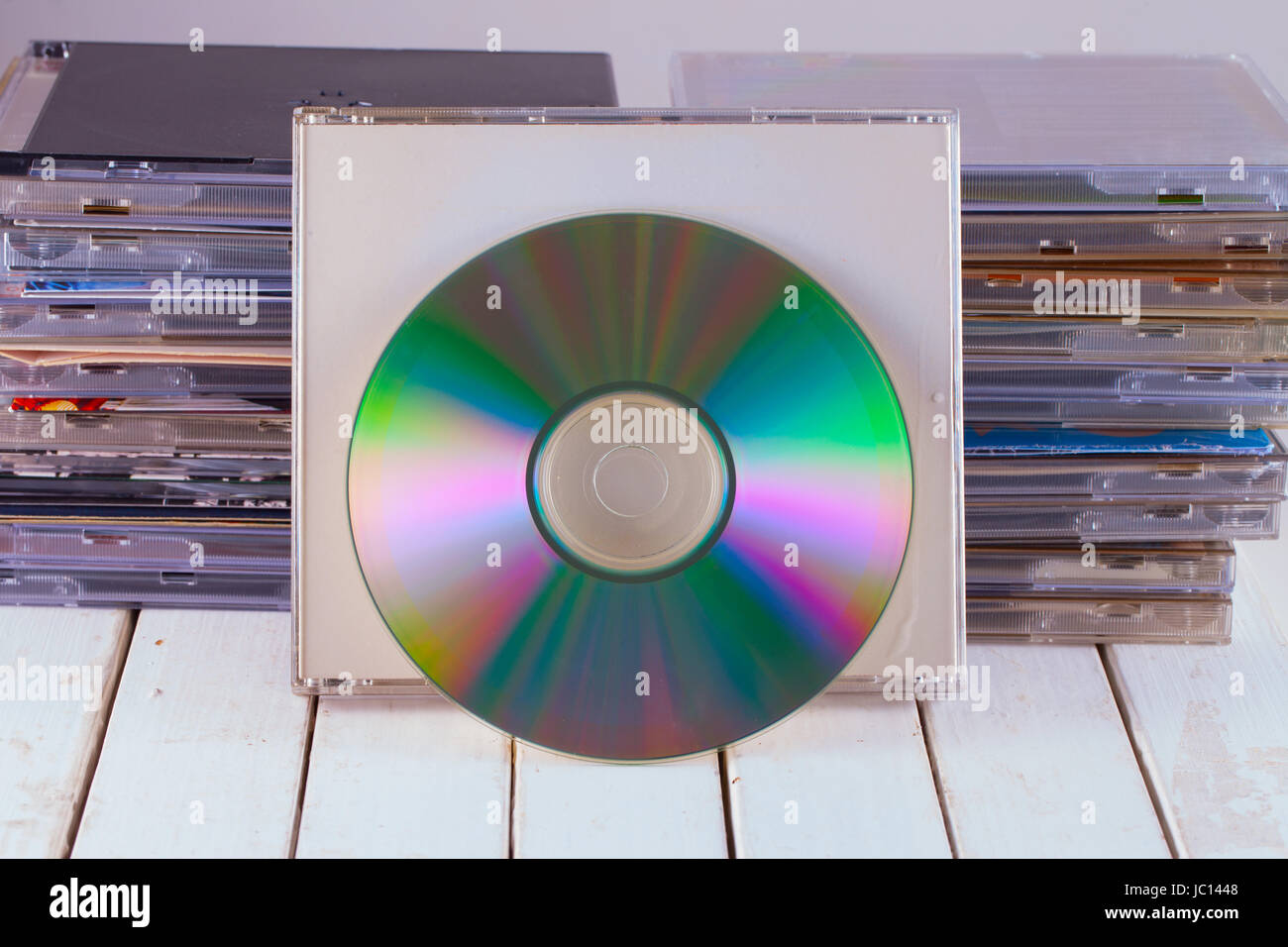 Cd leaning on a stack of cds Stock Photo - Alamy