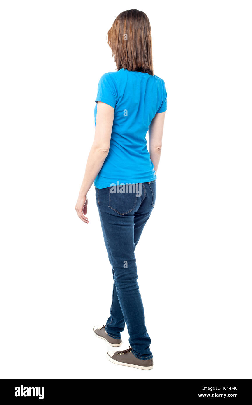 Full length portrait of woman walking, rear view Stock Photo - Alamy