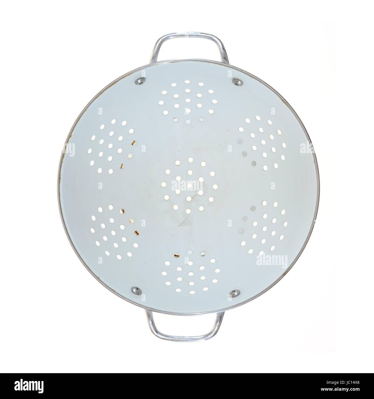 A close up shot of a draining colander Stock Photo - Alamy