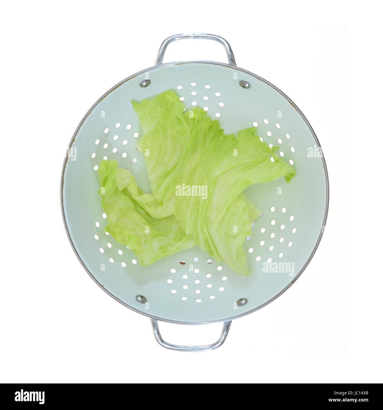 A close up shot of a draining colander Stock Photo - Alamy