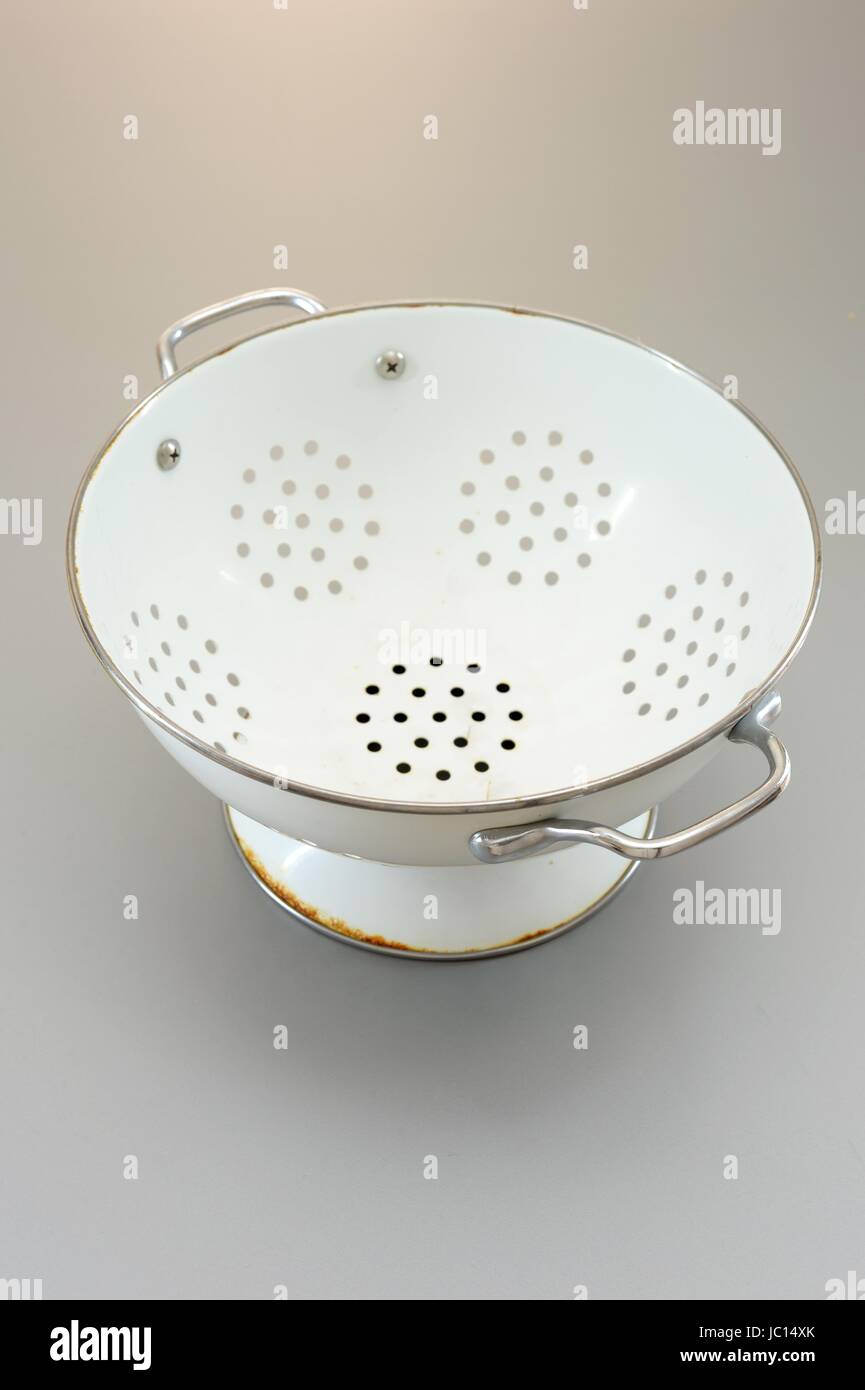 A close up shot of a draining colander Stock Photo - Alamy