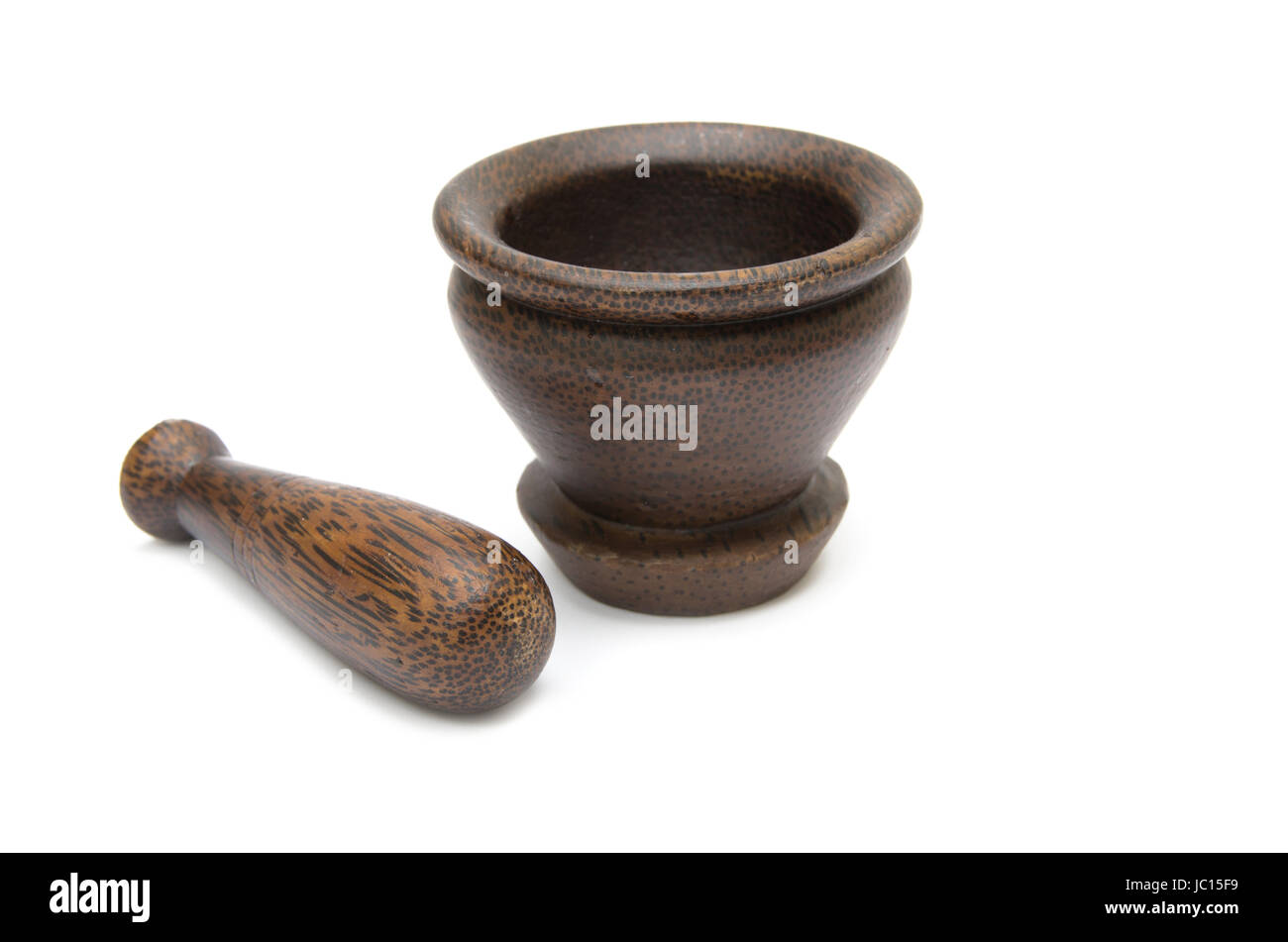 Handmade wooden mortar isolated on white background Stock Photo - Alamy