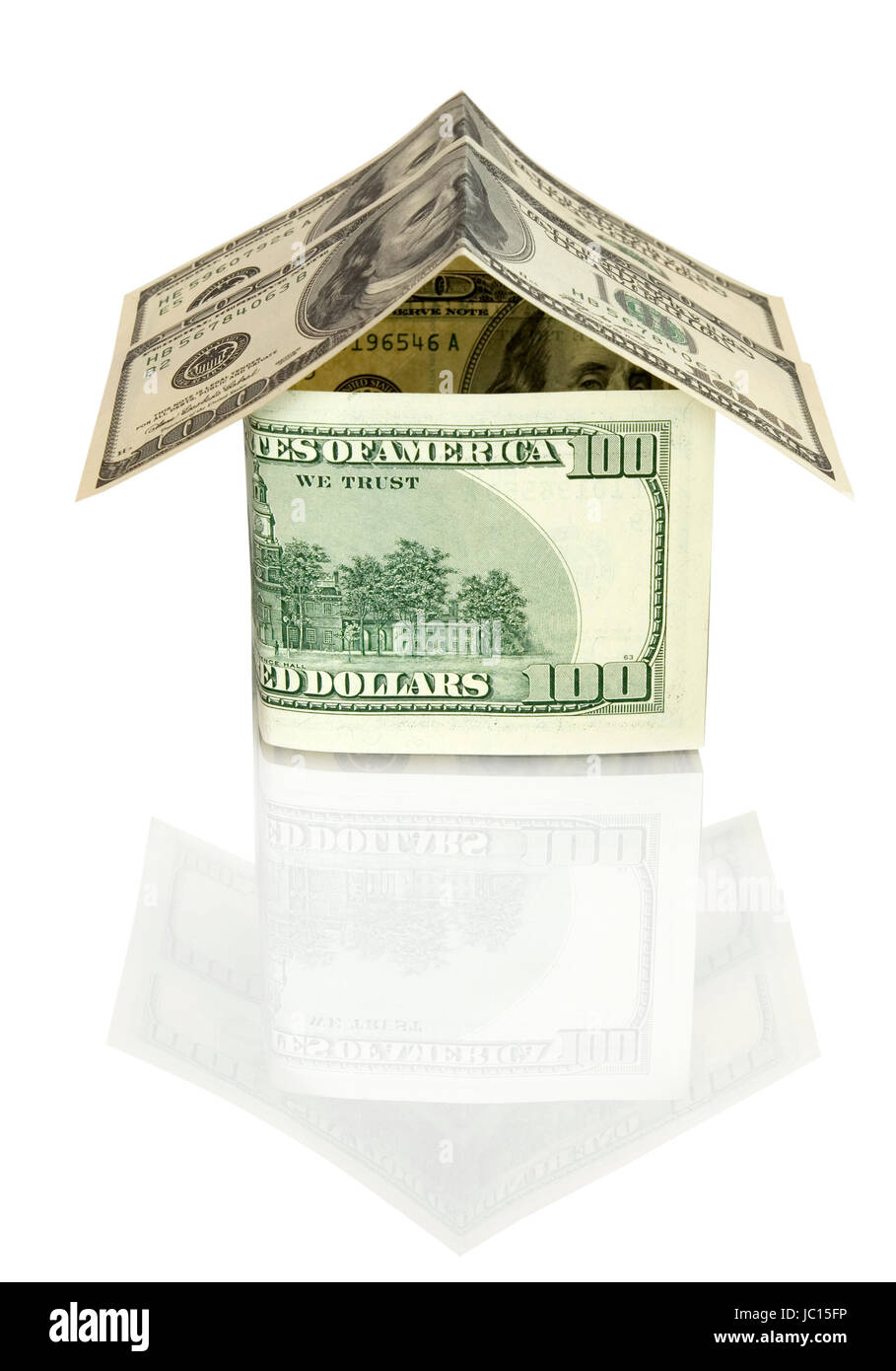 Money house on white background Stock Photo - Alamy