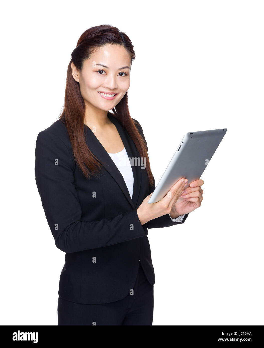 Asian business woman use tablet Stock Photo - Alamy