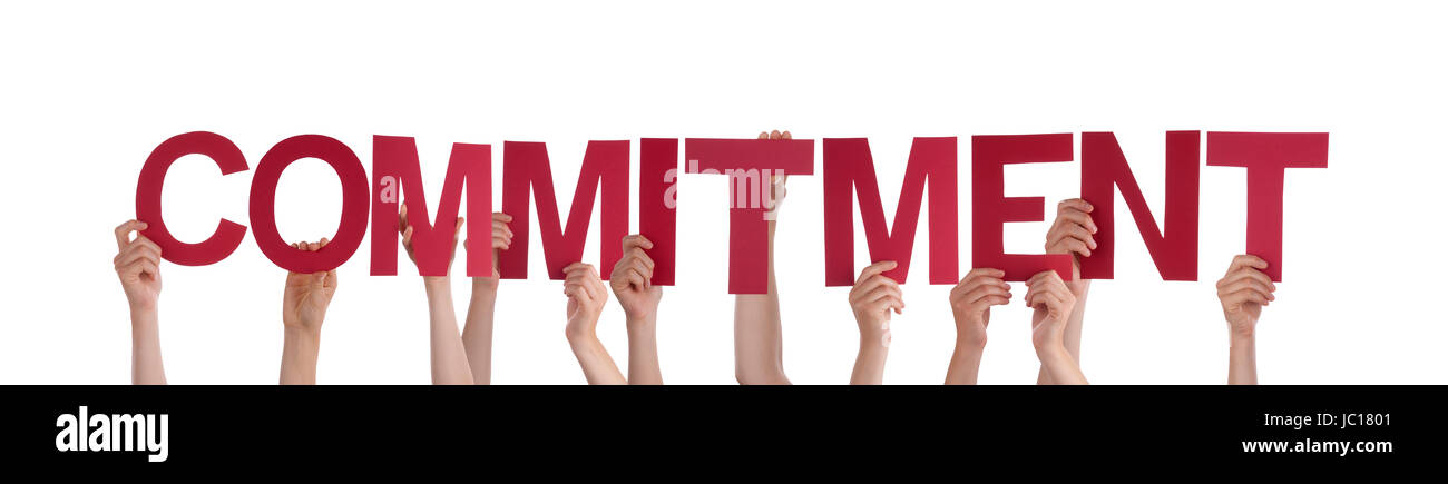 Many People Holding the Red Word Commitment, Isolated Stock Photo - Alamy