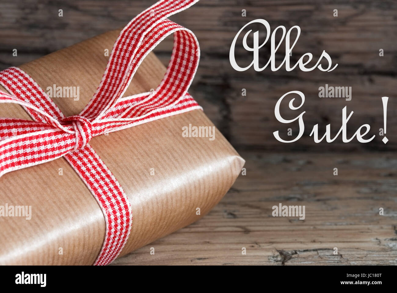 Brown Rustic Gift with the German Words Alles GUte, which means ...