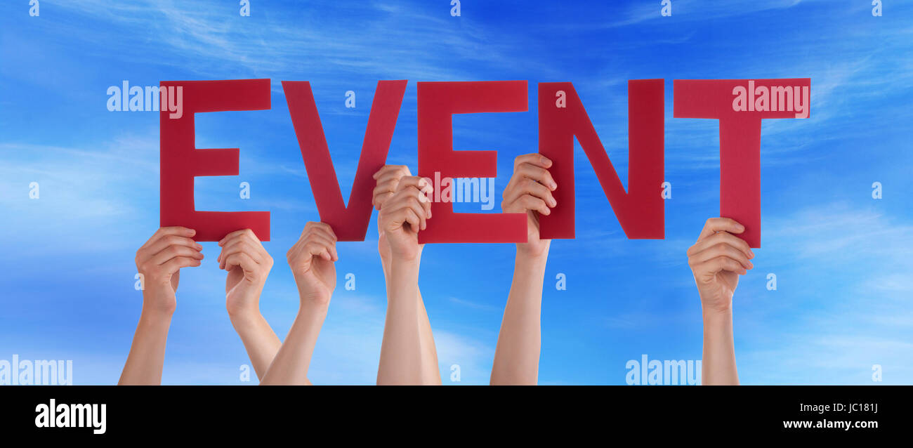Many People Holding the Word Event in the Sky Stock Photo - Alamy