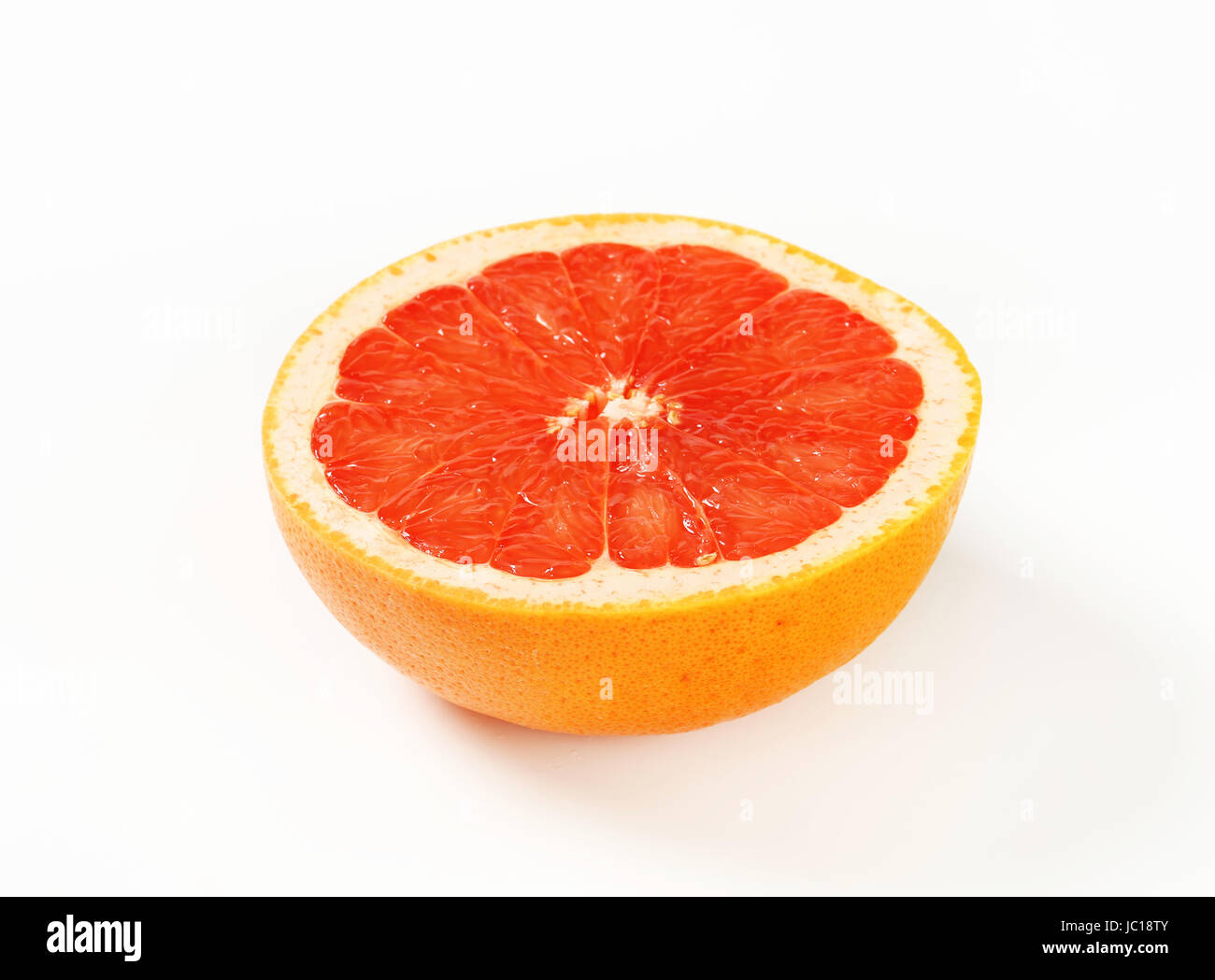Half a fresh red grapefruit Stock Photo - Alamy
