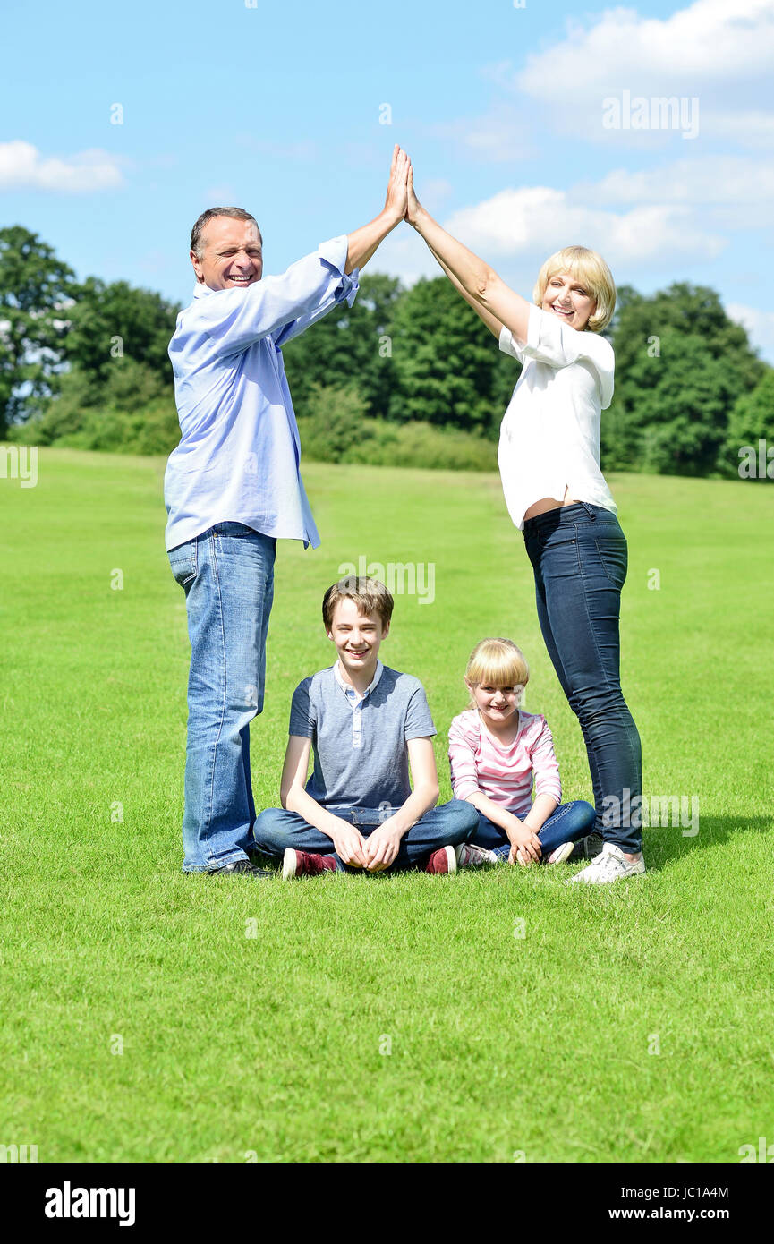 Affectionate family having fun together Stock Photo - Alamy
