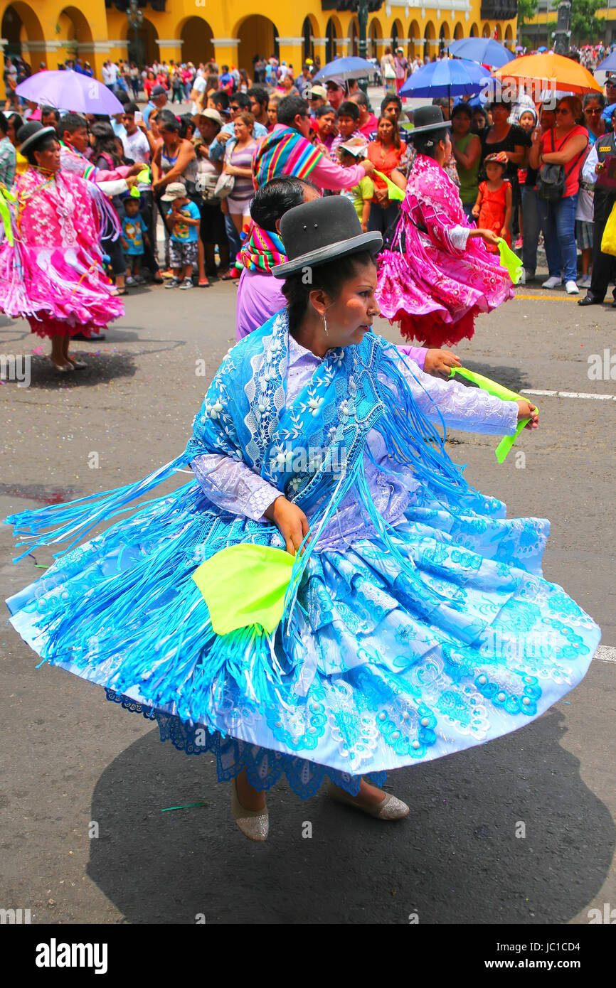 Local woman dancing during Festival of the Virgin de la Candelaria in ...
