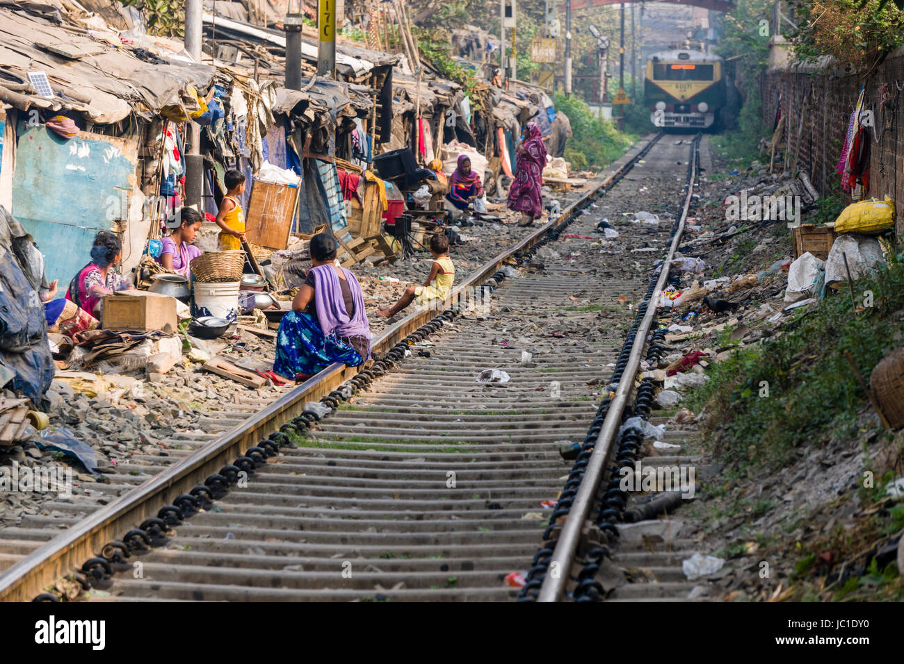 The dwellings and huts in China Bazar slum area are located right next ...