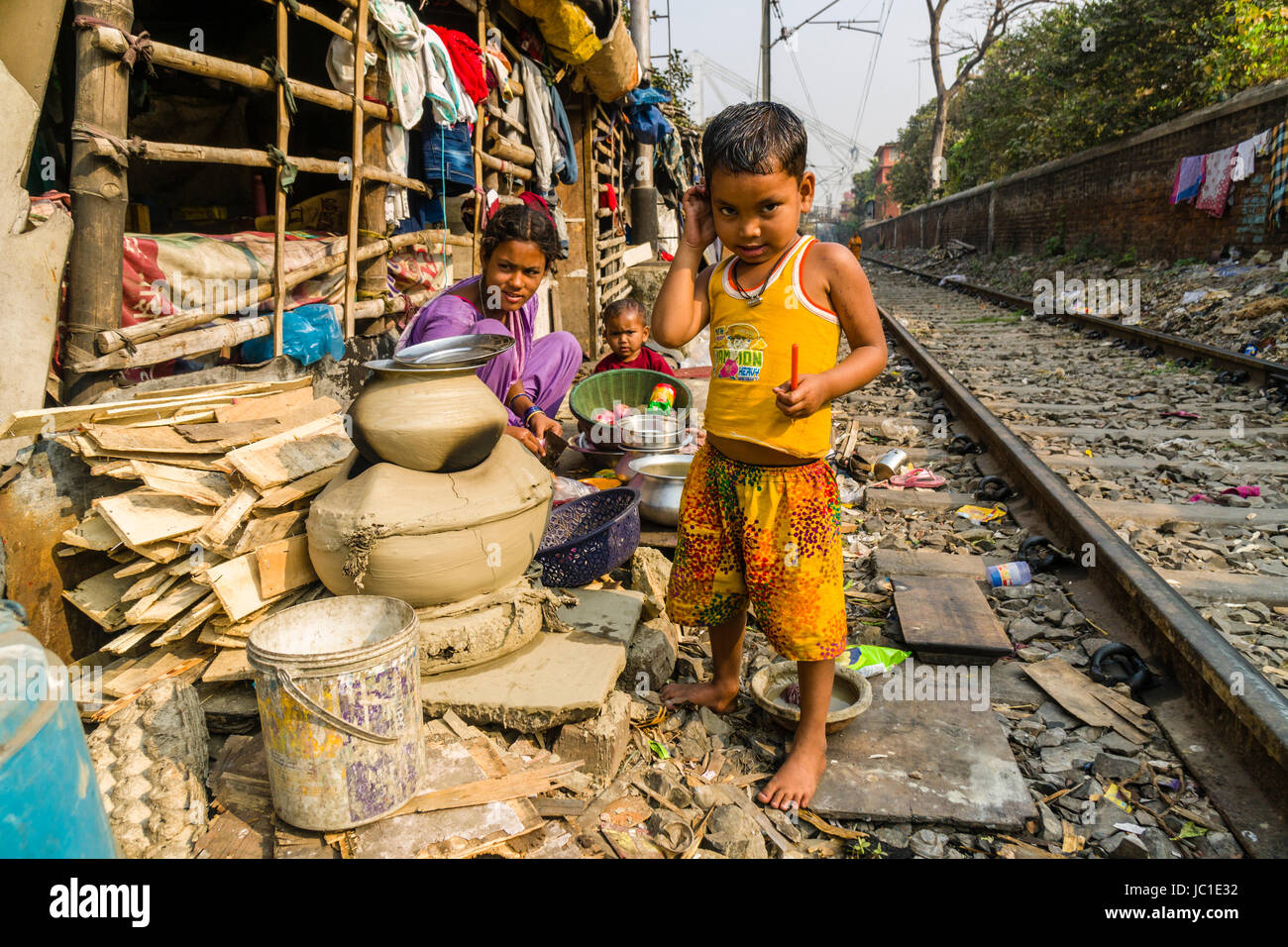 The dwellings and huts in China Bazar slum area are located right next ...