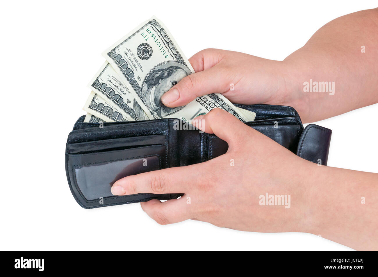 Hand pulling 100 dollars banknotes from wallet isolated on white ...