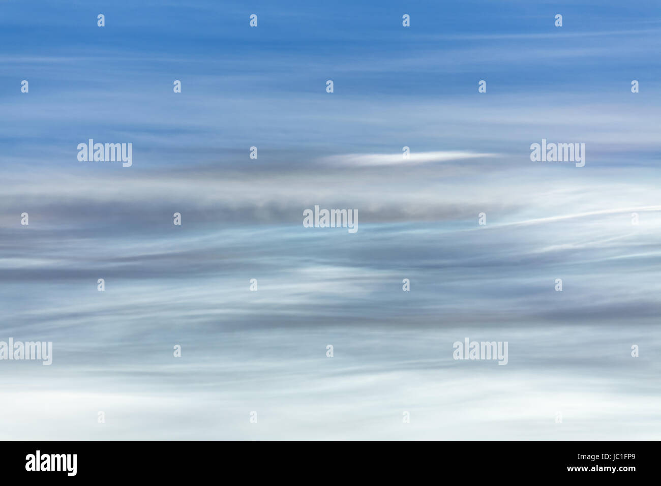 Vibrant abstract cloud formation at sunset sky Stock Photo - Alamy