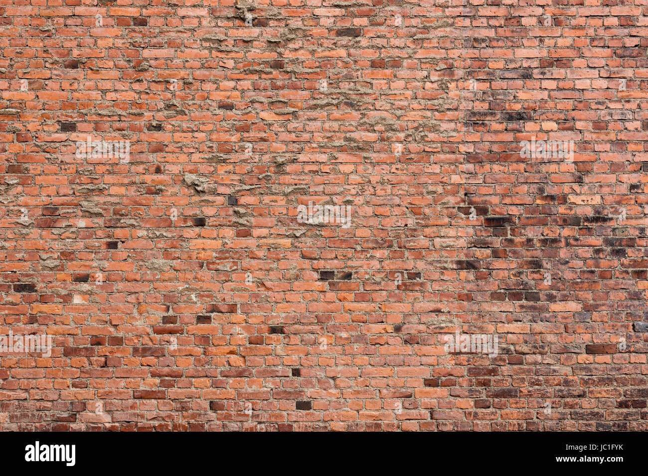 Old messy brick wall texture background exterior Stock Photo - Alamy