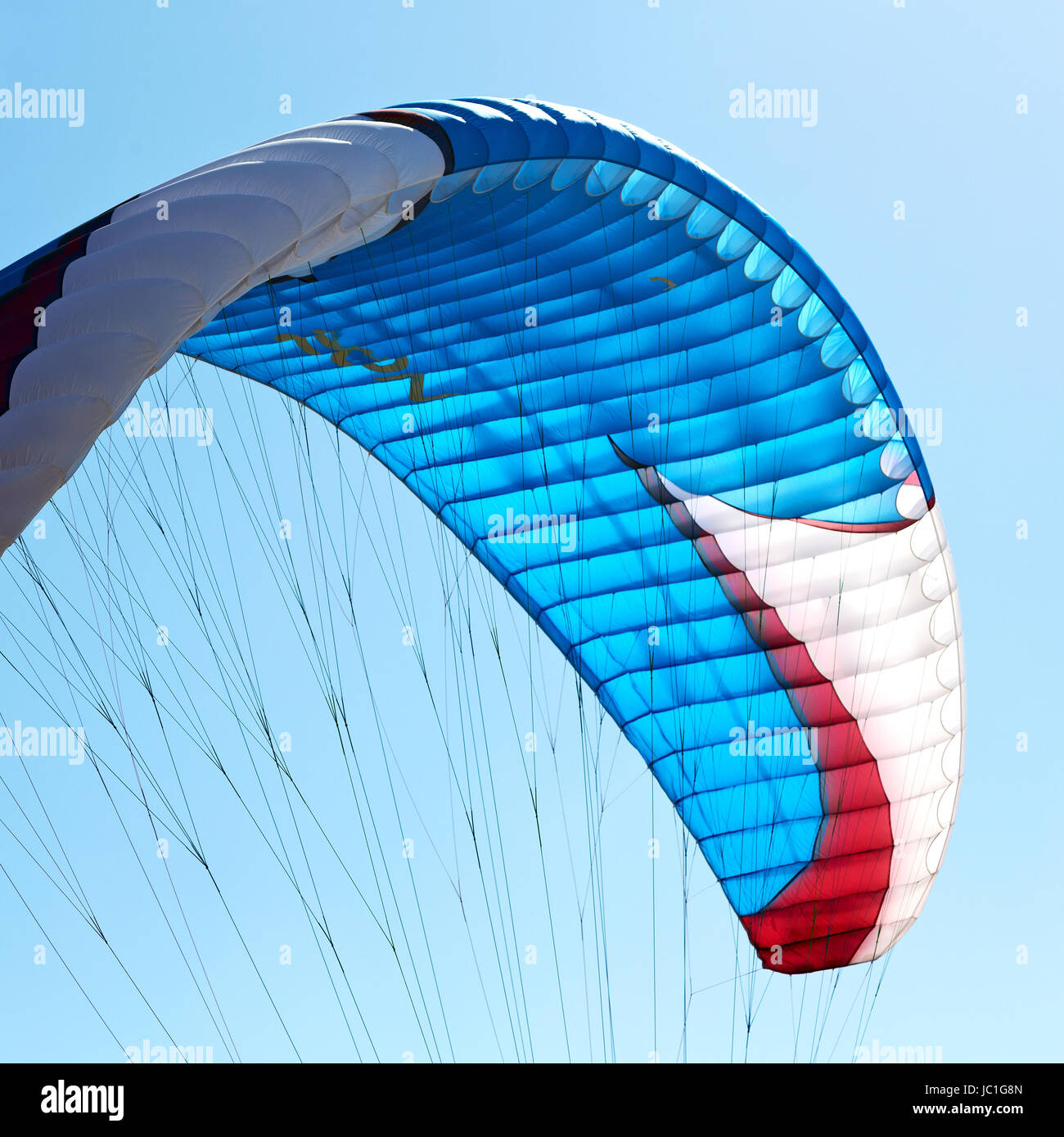 kite surfing colors in the sky background Stock Photo - Alamy