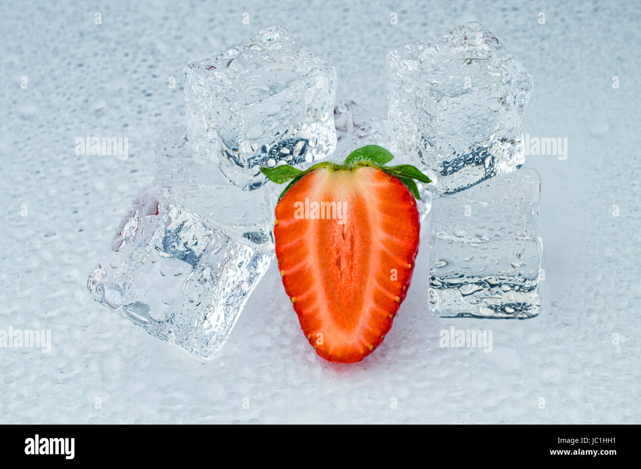 Strawberries with ice cubes Stock Photo - Alamy