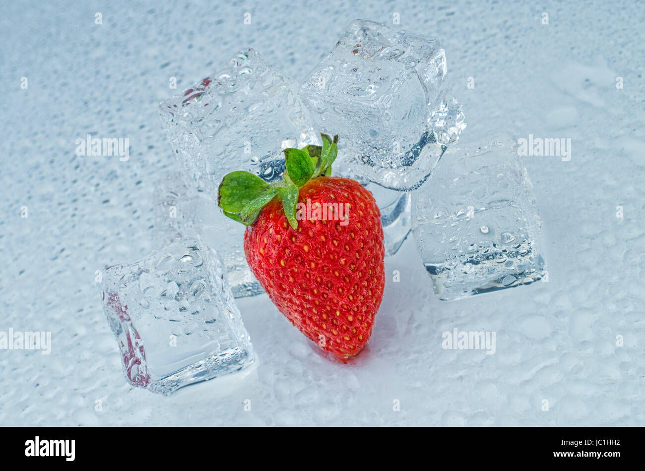 Strawberries with ice cubes Stock Photo - Alamy