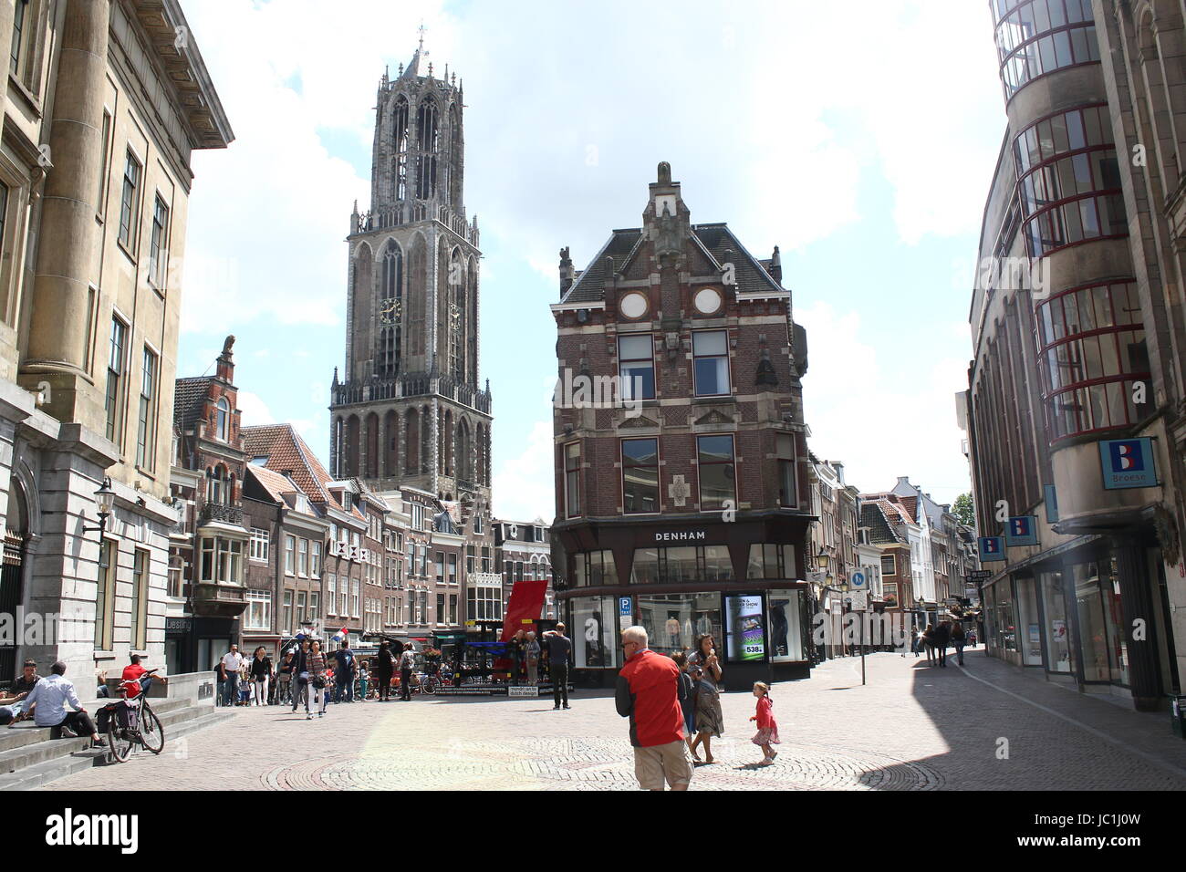 Busy Stadhuisbrug square with Utrecht City Hall (Stadhuis) in the ...