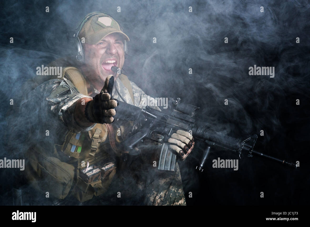 The attacking troops through the smoke after the explosion Stock Photo ...