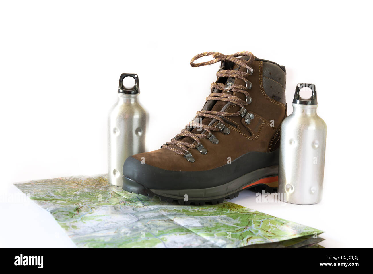 hiking boot with two water bottles and a topographic map Stock Photo ...