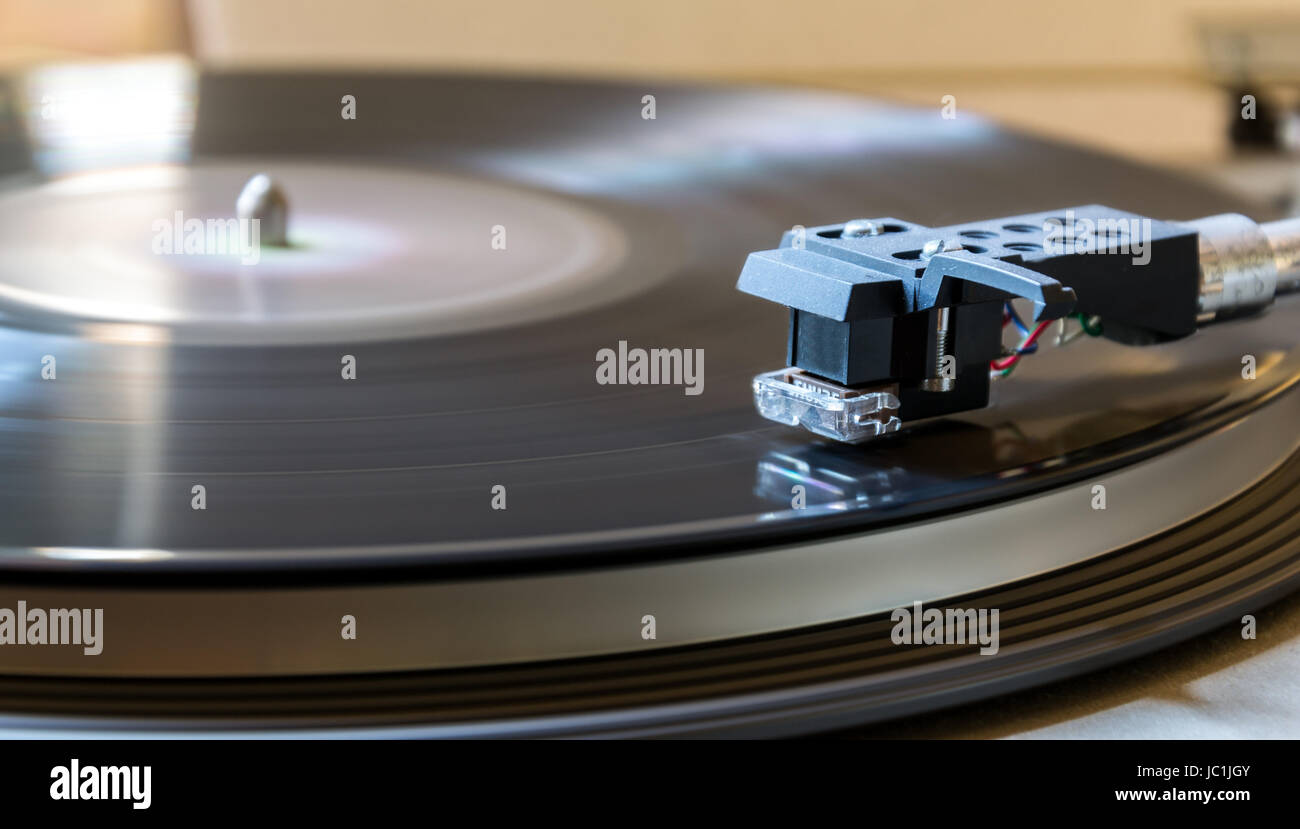 Modern record player with a vinyl Stock Photo - Alamy
