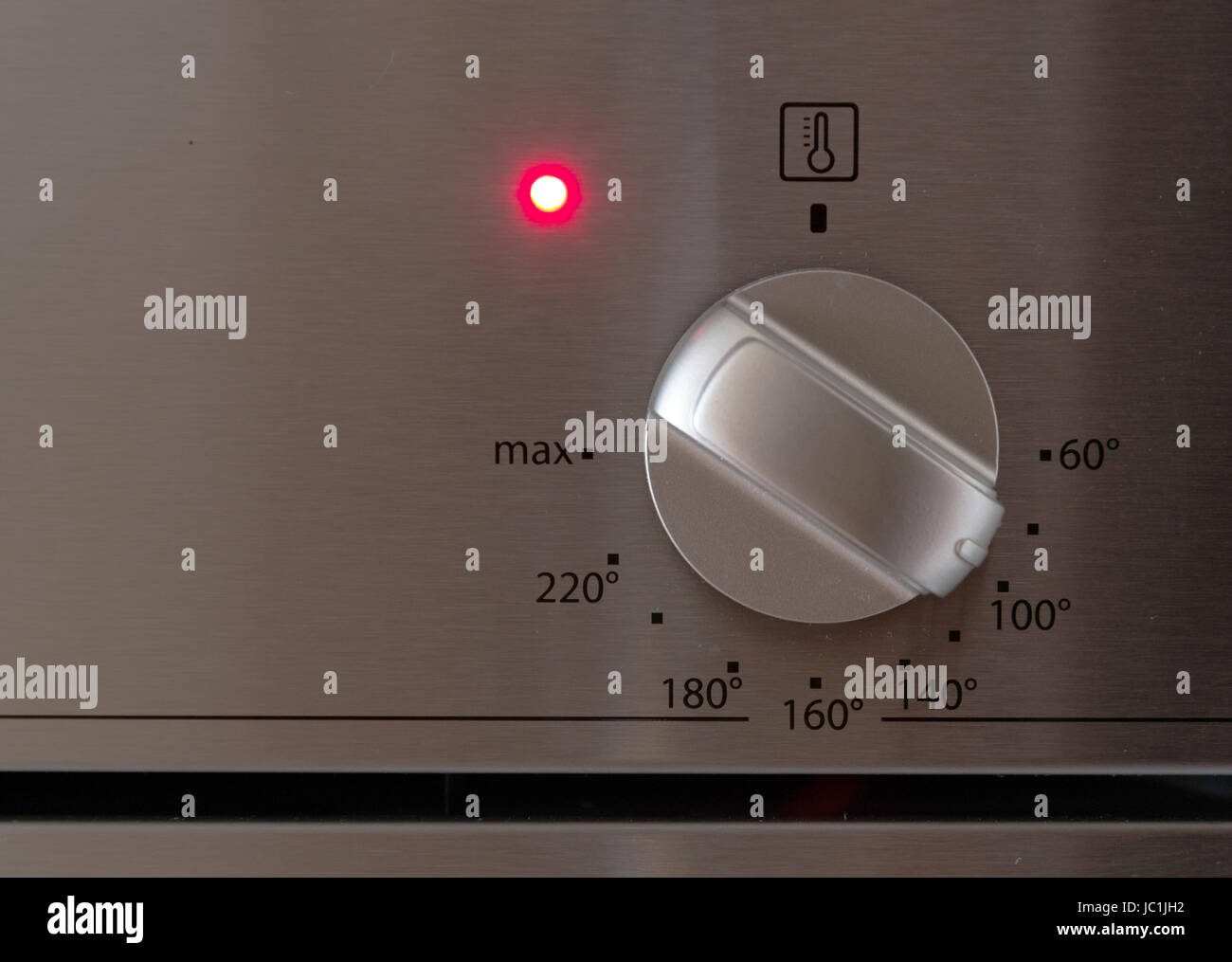 Temperature indicator of a modern oven Stock Photo - Alamy