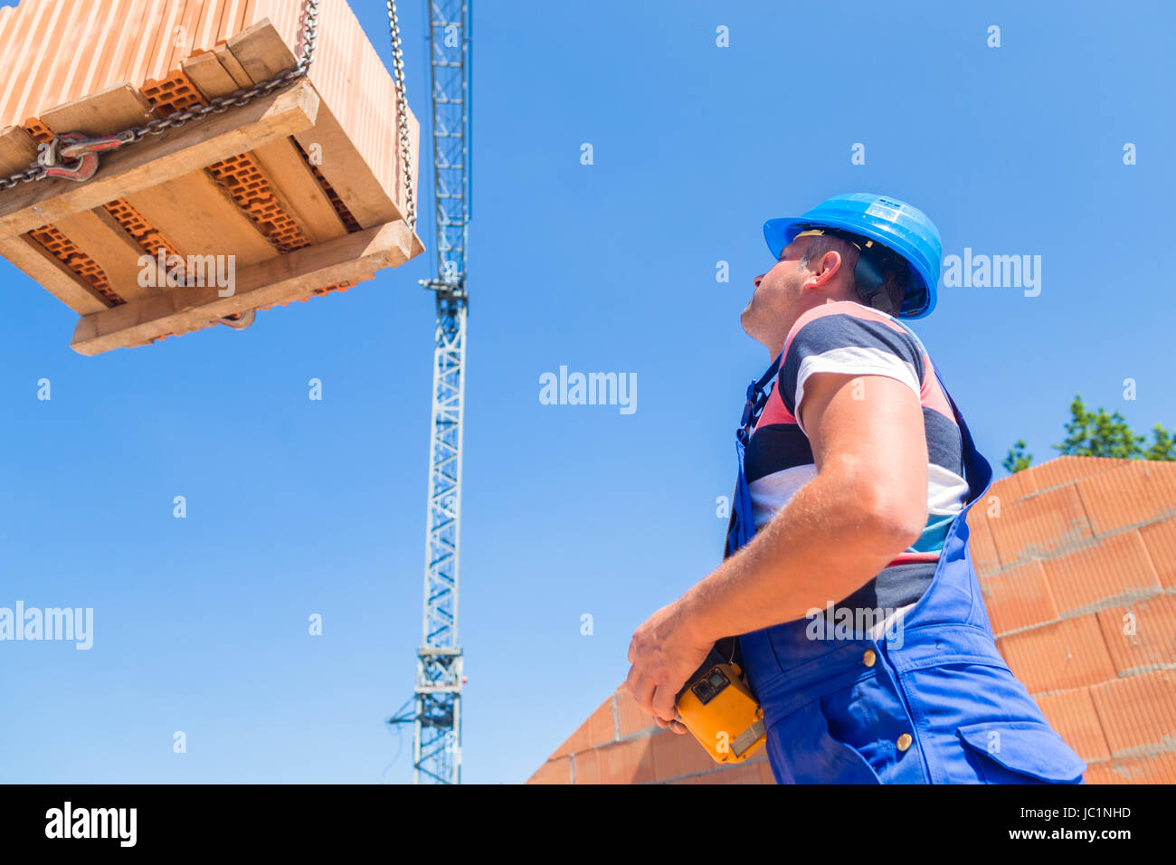Brick pallet crane hi-res stock photography and images - Alamy
