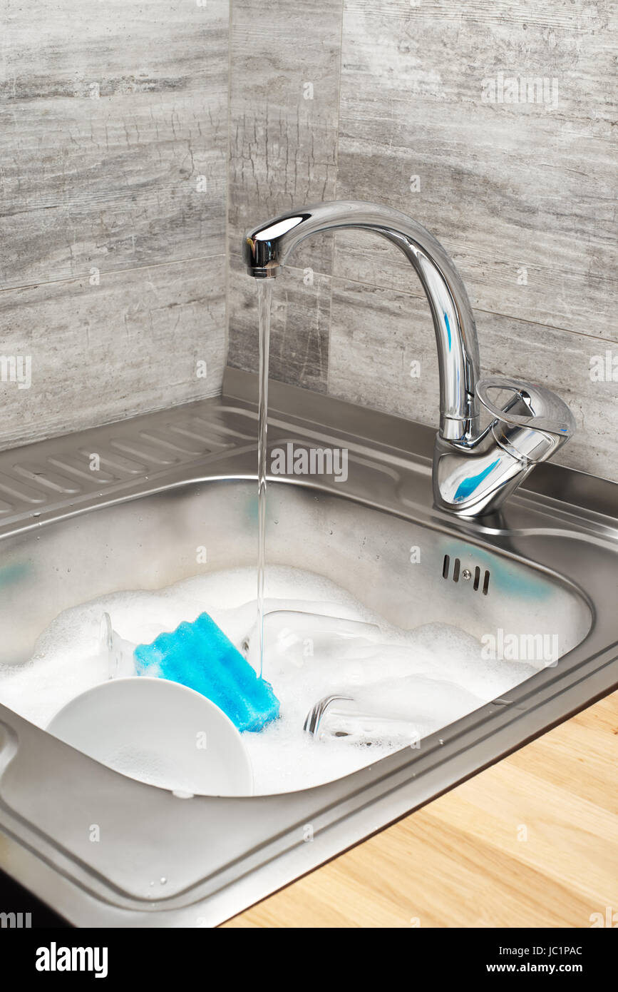 Kitchen sink water and plastic hi-res stock photography and images - Alamy