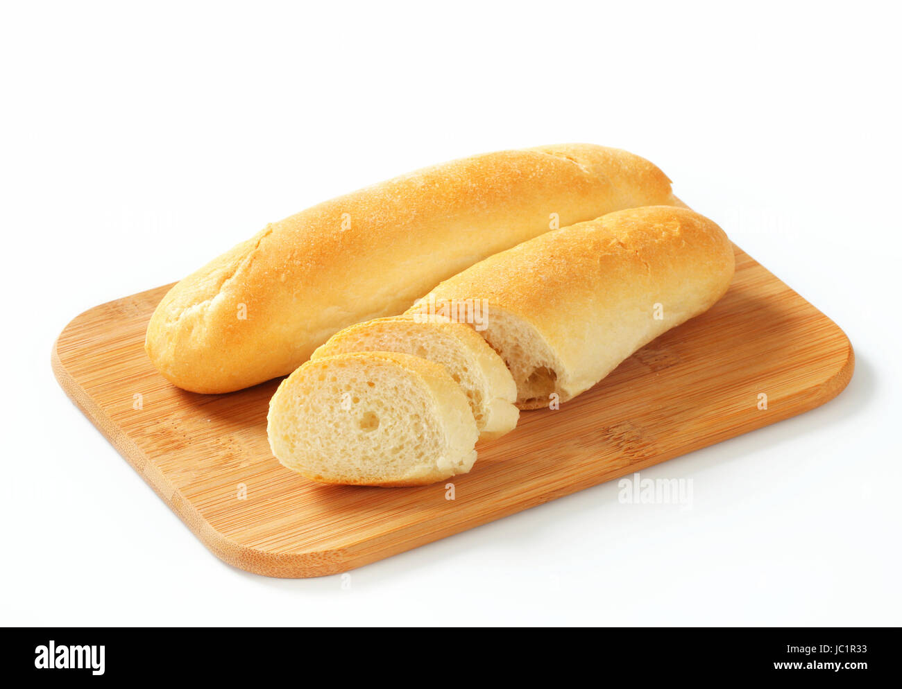 White bread rolls on cutting board Stock Photo - Alamy