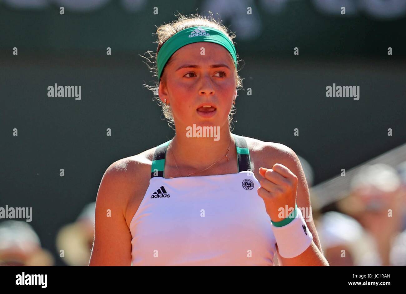 Latvian tennis player Jelena Ostapenko is in action during her match in ...