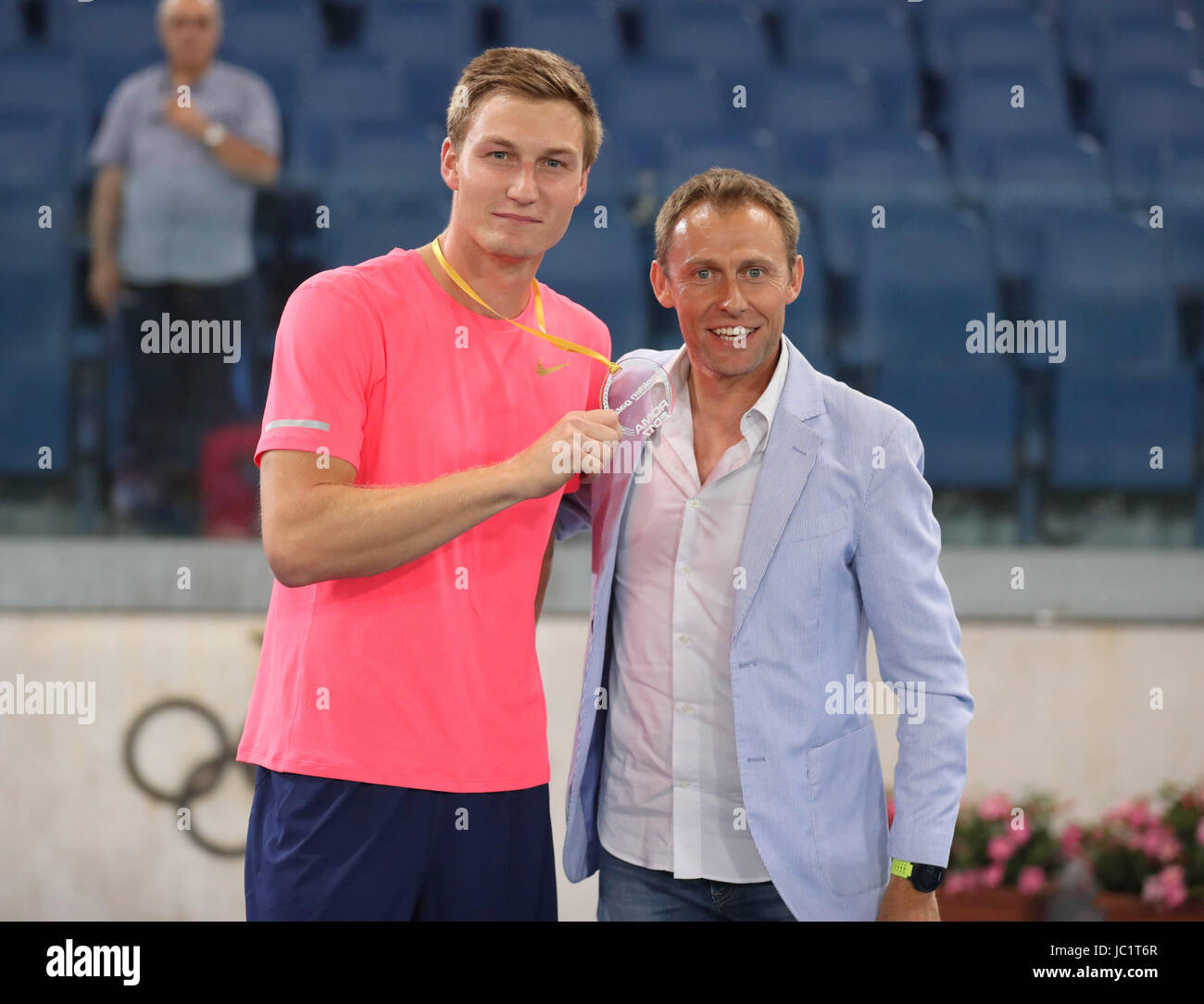 Javelin throw winner Thomas Rohler (GER), left, poses with marathon ...