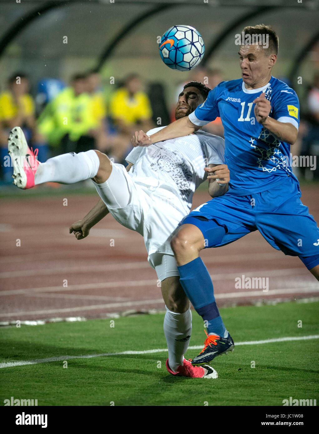 Tehran, Iran. 12th June, 2017. Alireza jahanbakhsh (L) of Iran competes ...